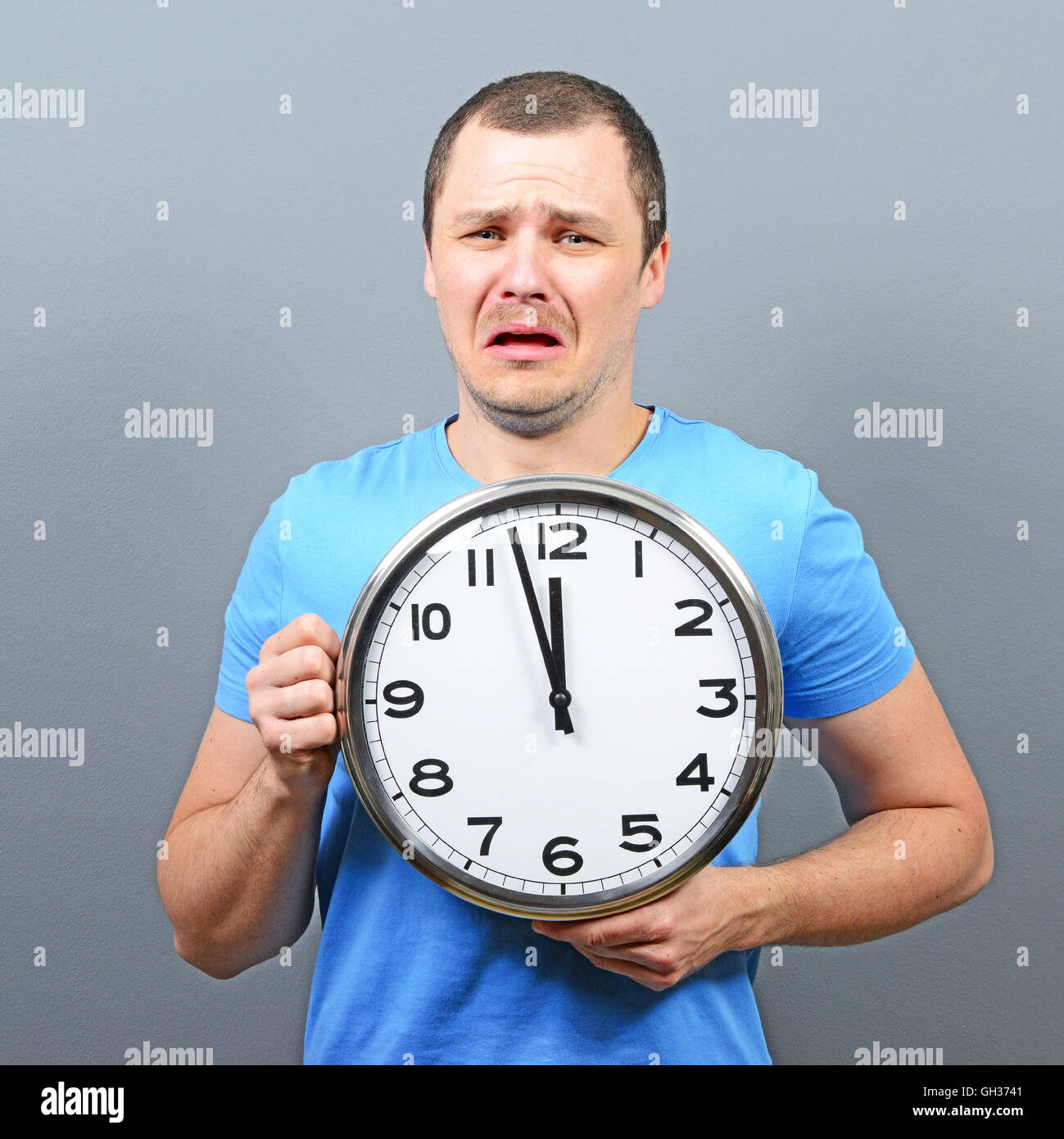 Portrait of man afraid of getting late concept Stock Photo - Alamy