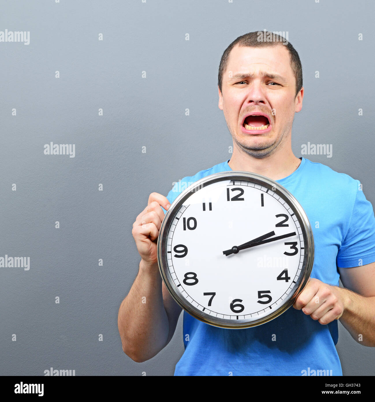 Portrait of man afraid of getting late concept Stock Photo - Alamy