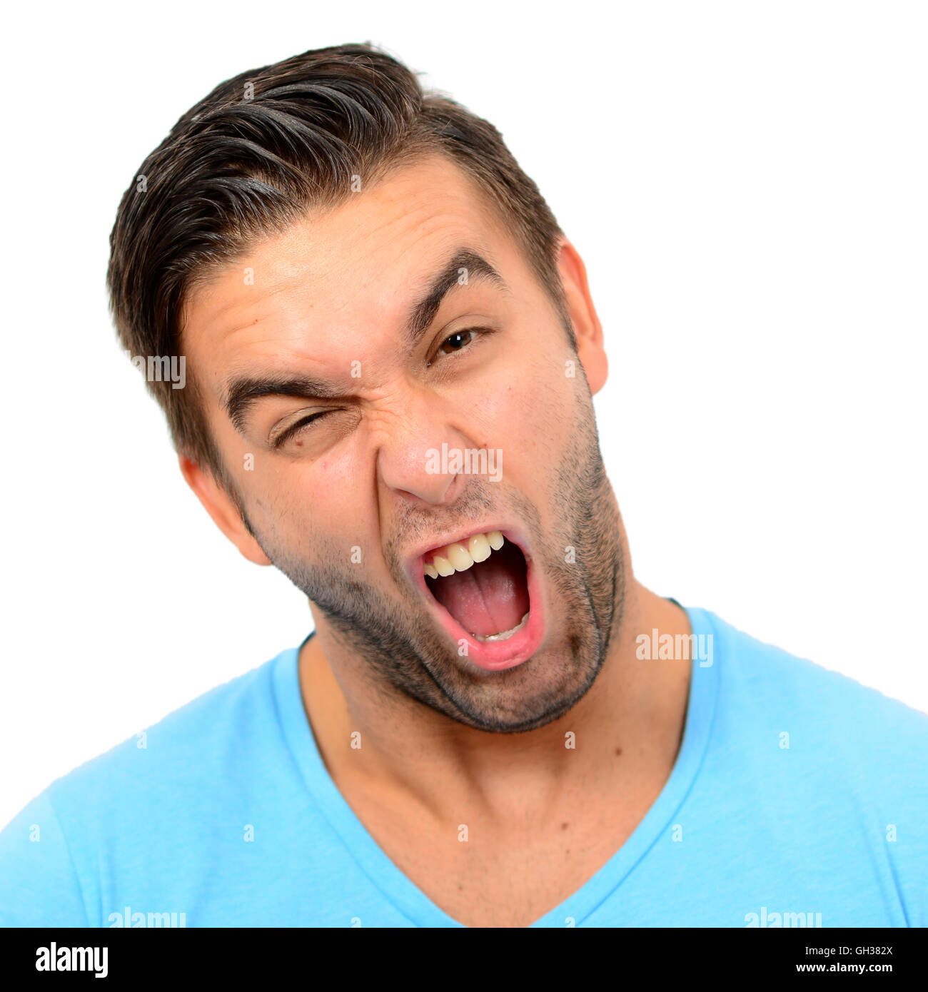 Portrait of angry man screaming against white background Stock Photo ...