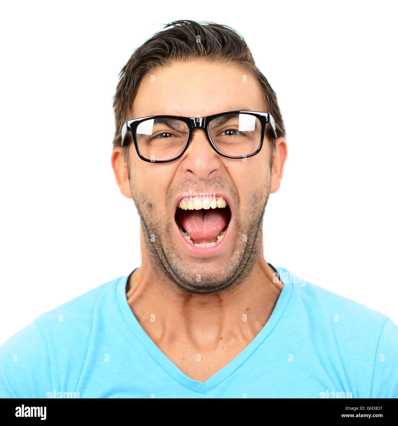 Portrait of angry man screaming against white background Stock Photo ...