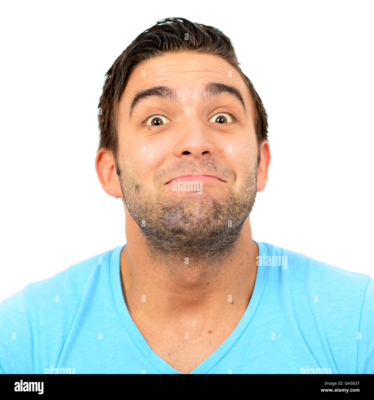 Portrait of clueless man against white background Stock Photo - Alamy