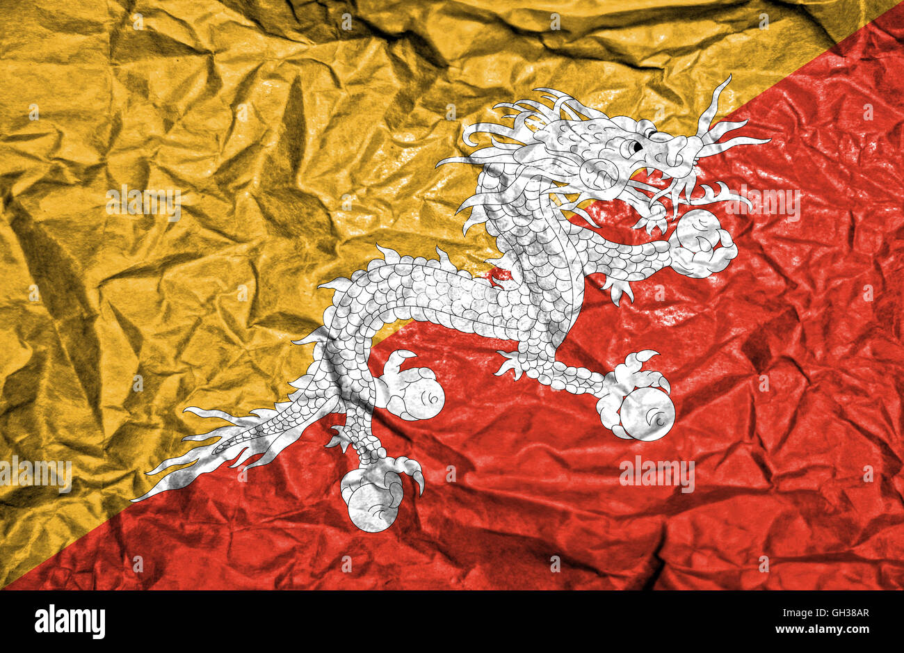 Bhutan vintage flag on old crumpled paper background Stock Photo - Alamy