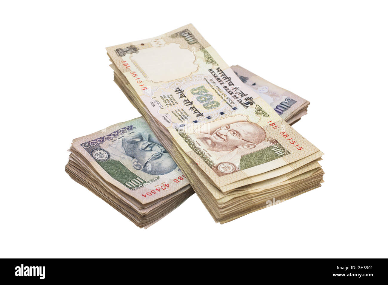 A stack of 500 and 100 rupee notes isolated on a white background Stock ...