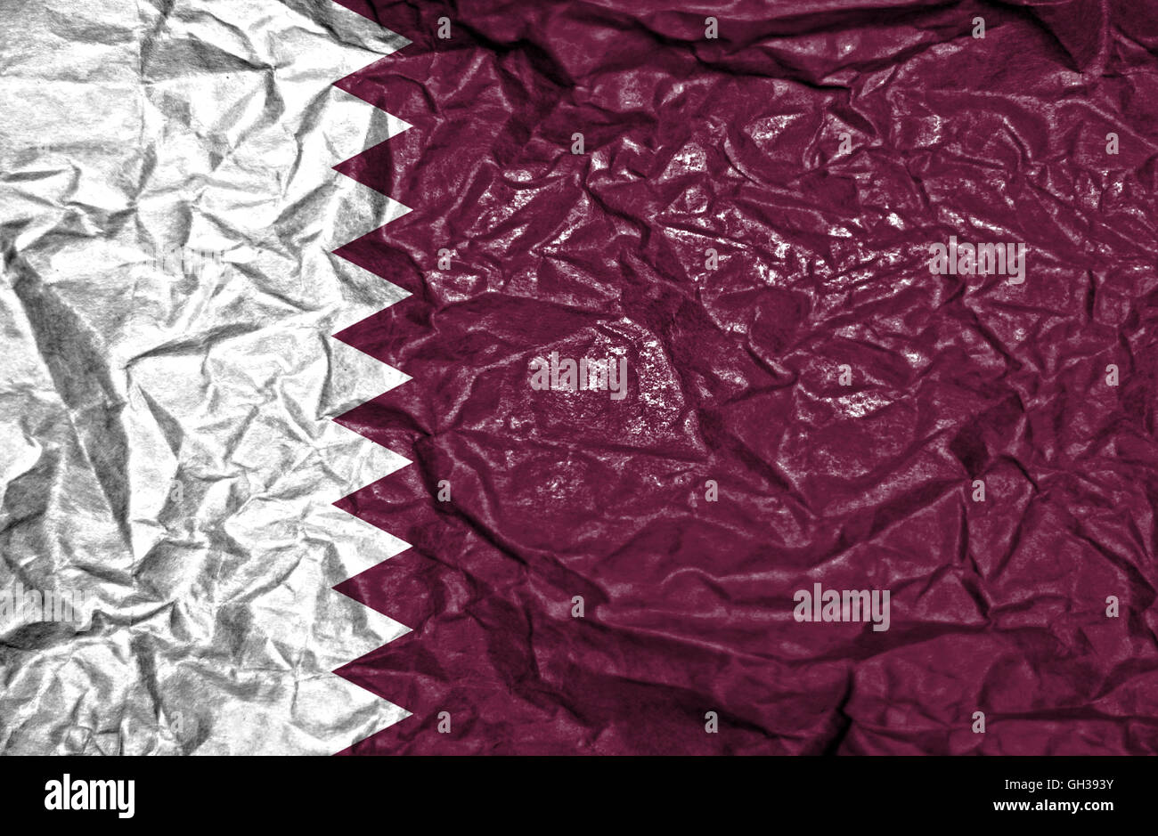 Qatar vintage flag on old crumpled paper background Stock Photo - Alamy