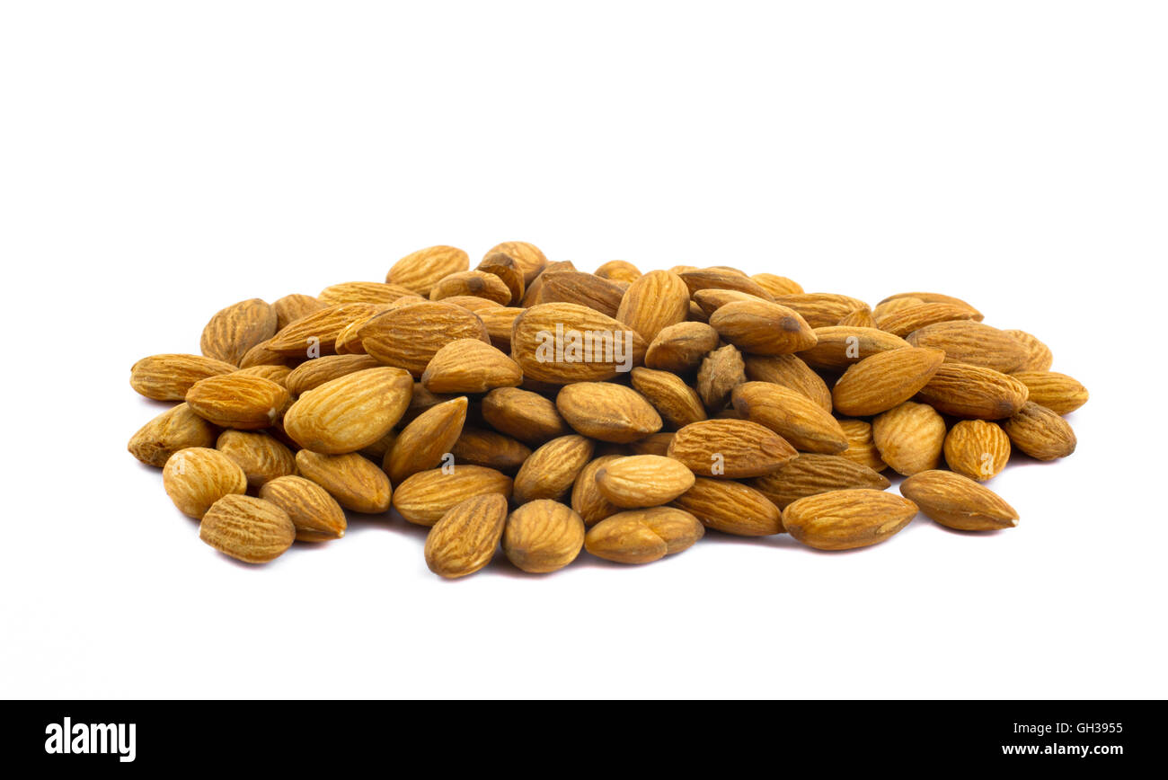 A pile of almonds isolated on a white background Stock Photo - Alamy