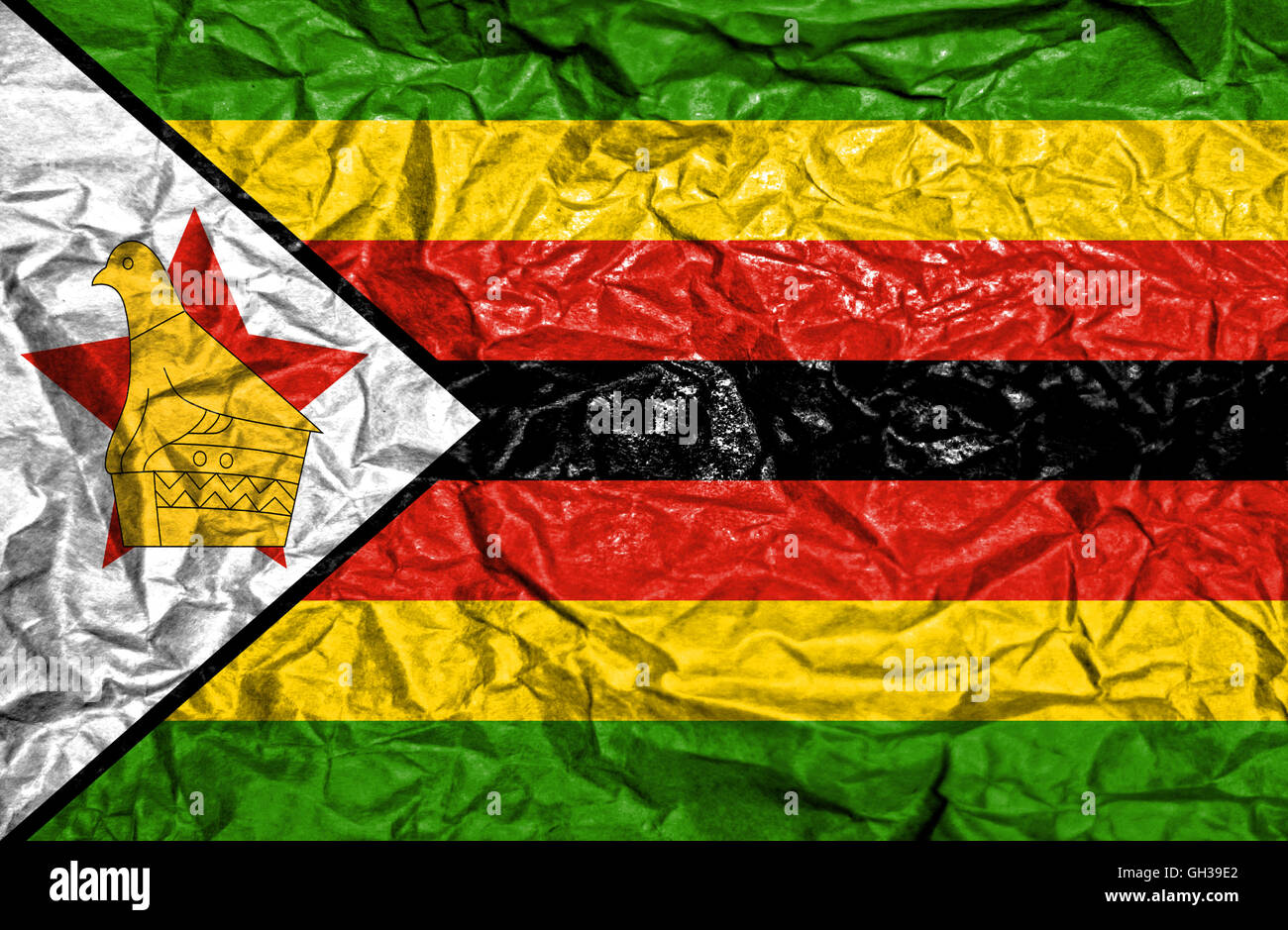 Zimbabwe vintage flag on old crumpled paper background Stock Photo - Alamy