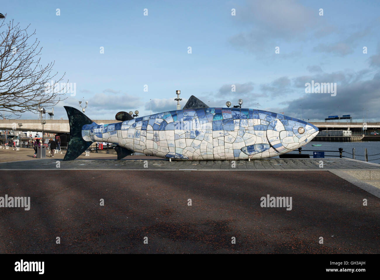 The Big Fish on the banks of the River Lagan showing images of Belfast ...
