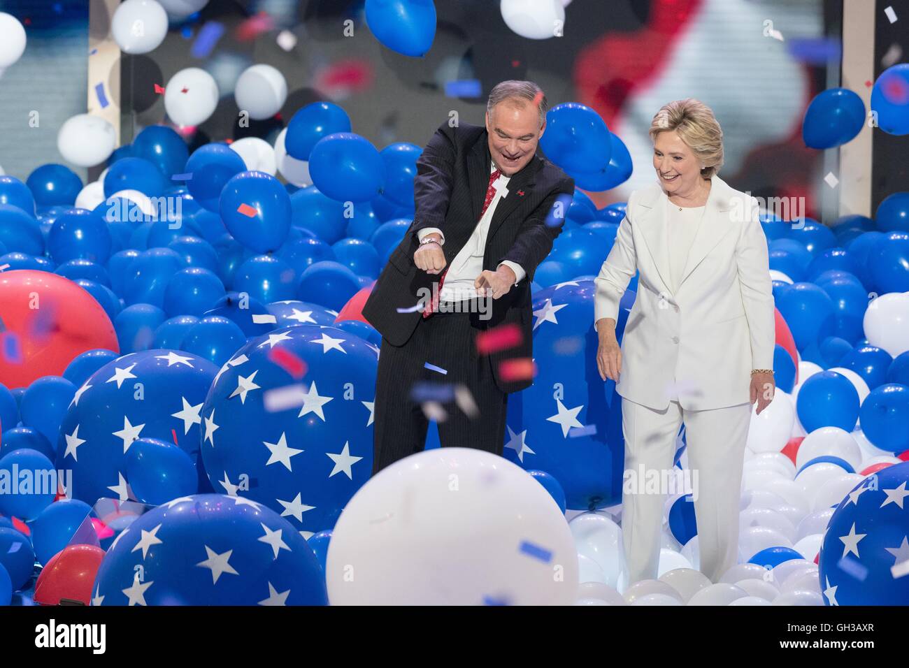 Hillary Clinton and running mate Gov. Tim Kaine wave during the balloon ...
