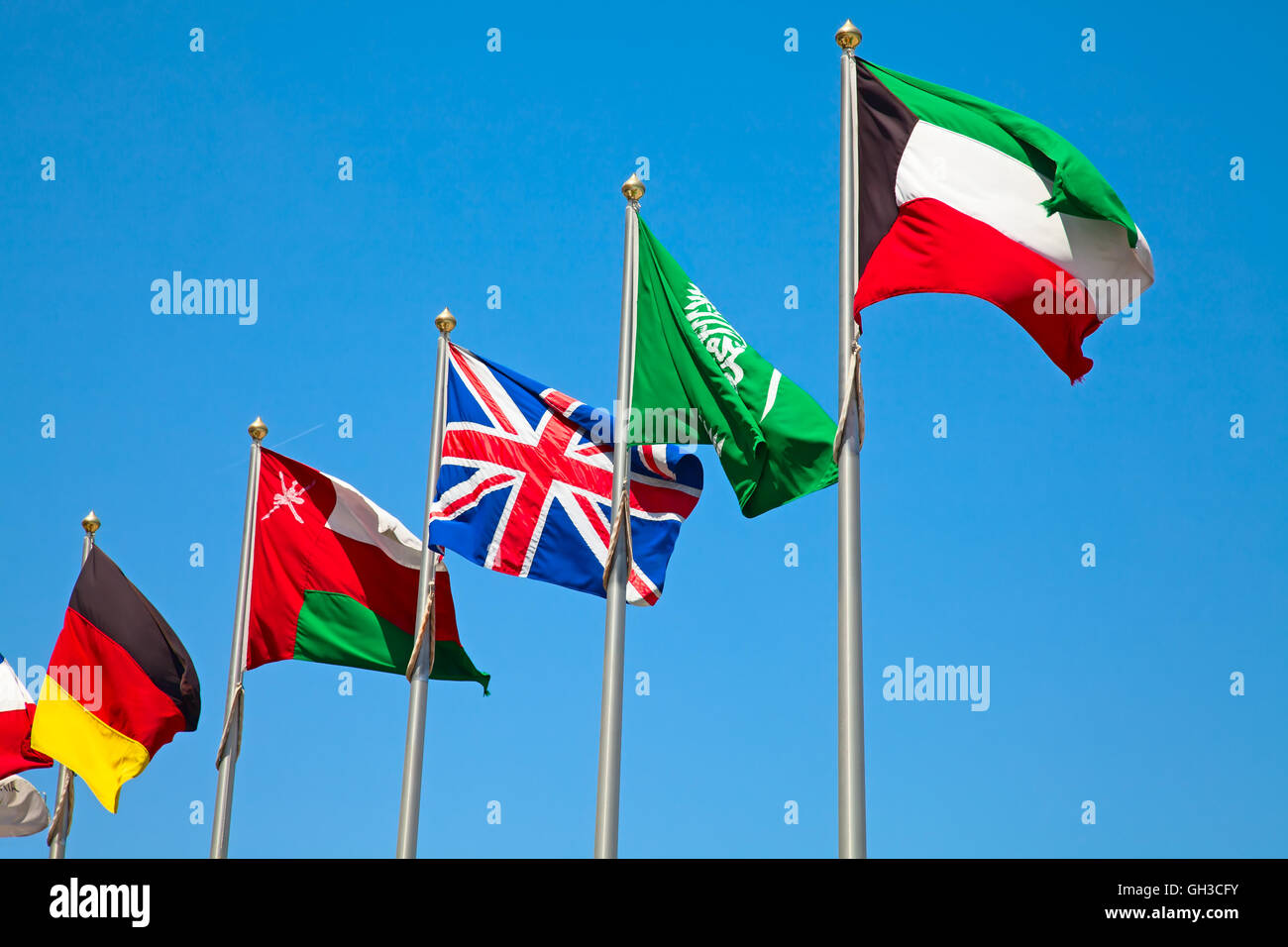 Middle east and european coutries flags in the blue sky Stock Photo - Alamy