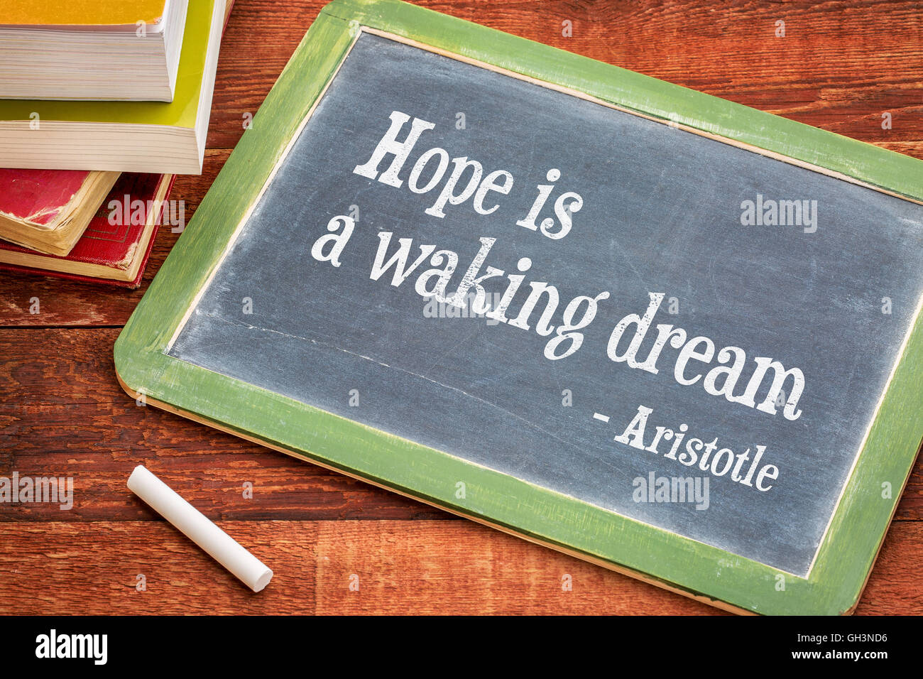 Hope is a waking dream - Aristotle quote - text on a slate blackboard ...