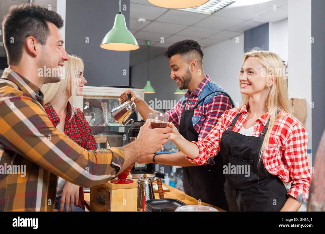 Barista serving clients give cup tea coffee shop bar counter Stock ...