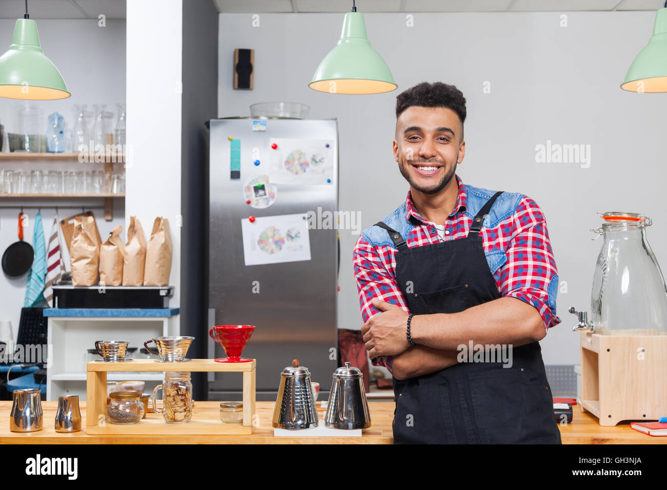 Barista coffee shop owner handsome man happy smile sitting on bar Stock ...
