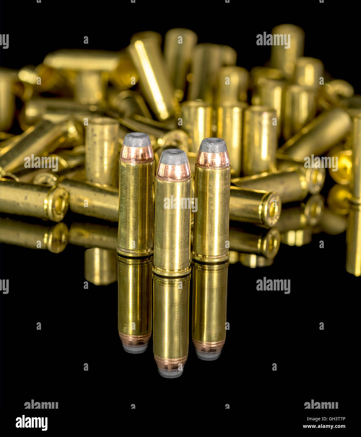 Classic handgun ammunition and reflection Stock Photo - Alamy