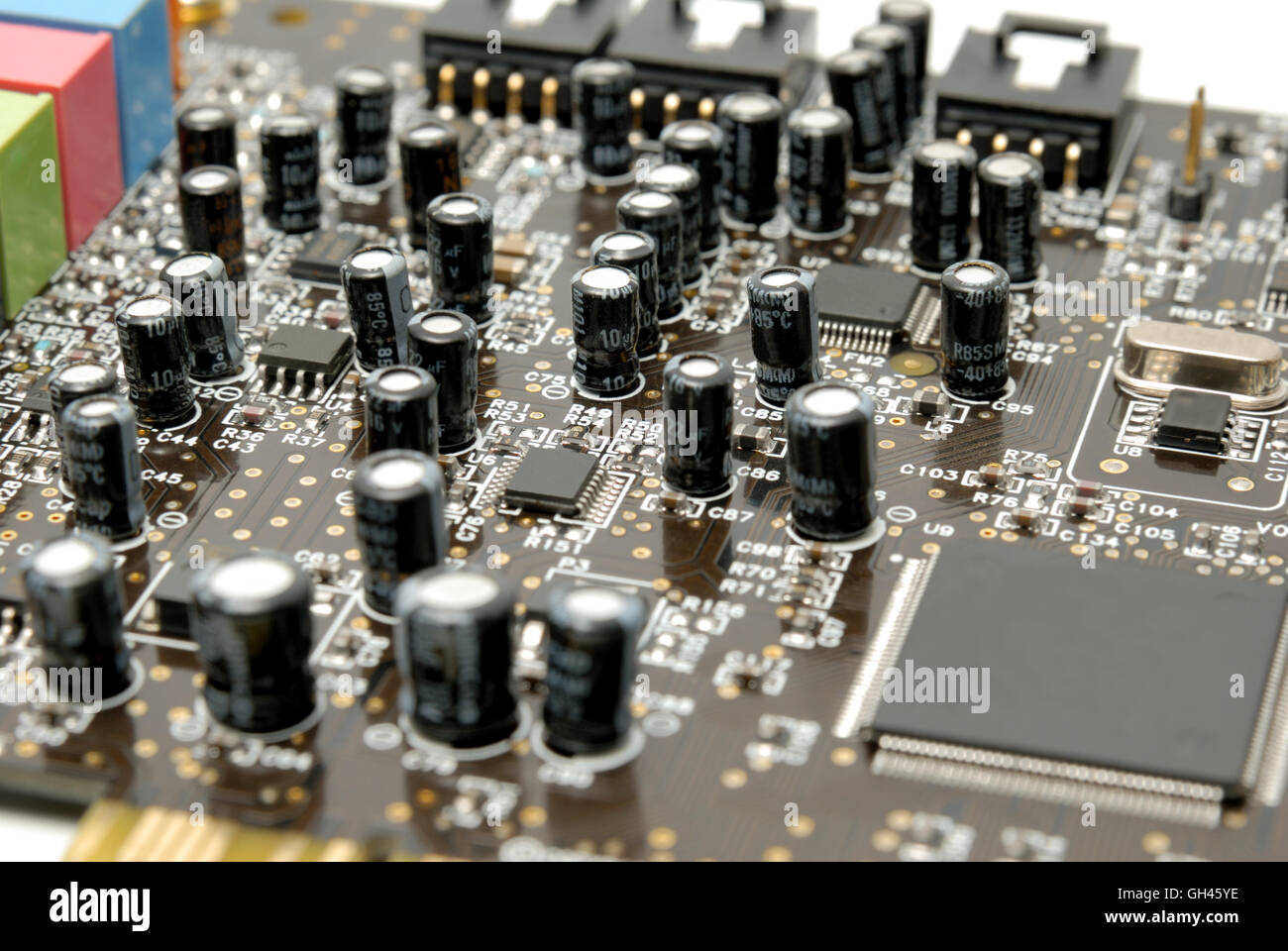 The printed-circuit-board with computer chips resistors and condensers ...