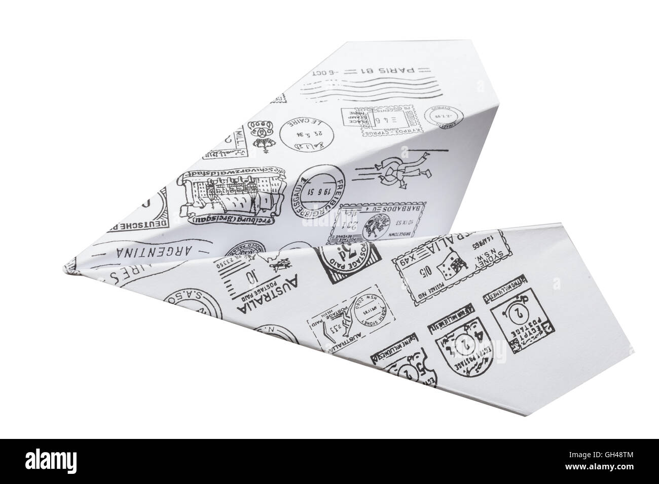 Paper airplane with mail stamps on white background Stock Photo - Alamy