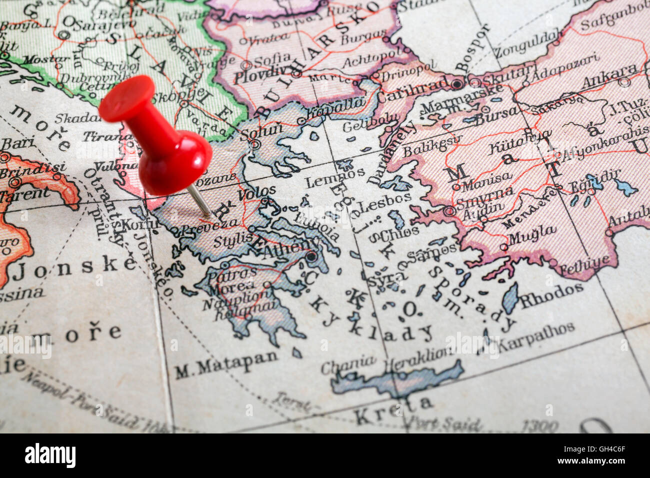 Red push pin showing the location of a destination point on a map ...