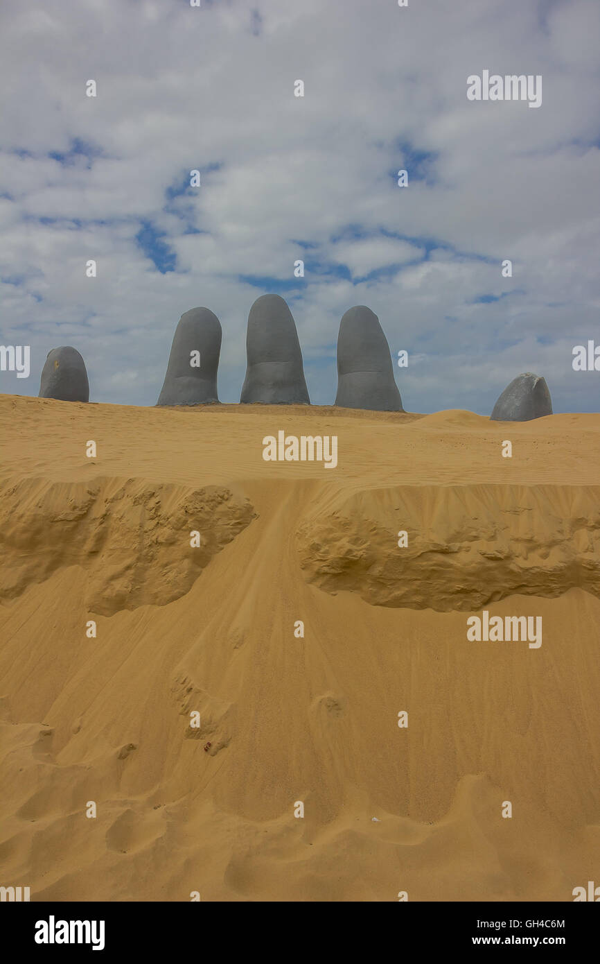 PUNTA DEL ESTE, URUGUAY - MAY 04, 2016: five human fingers emerging ...