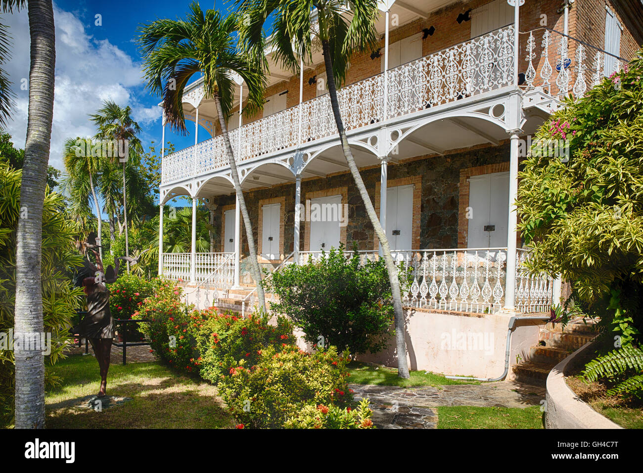 Low Angle View of a Colonial House with Double Cast-Iron Balcony, Villa ...