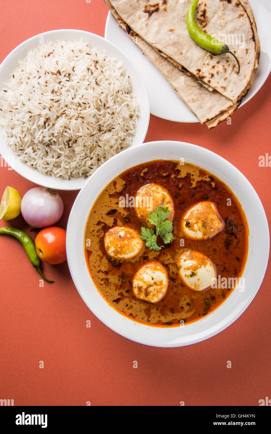 egg curry with roti/chapati and jeera rice, tasty and spicy anda curry ...