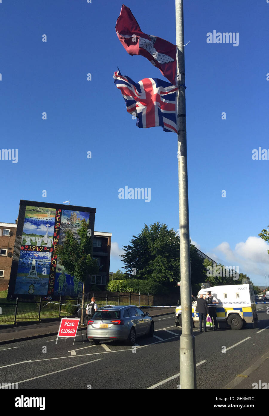 Police at the scene in Sunningdale Gardens, north Belfast, after ...