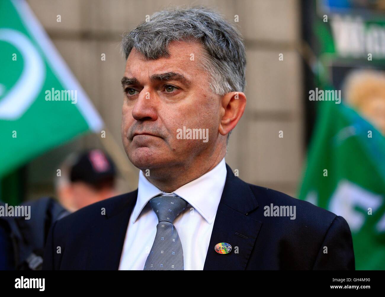 Mick Cash, general secretary of the RMT, joins a picket line opposite ...