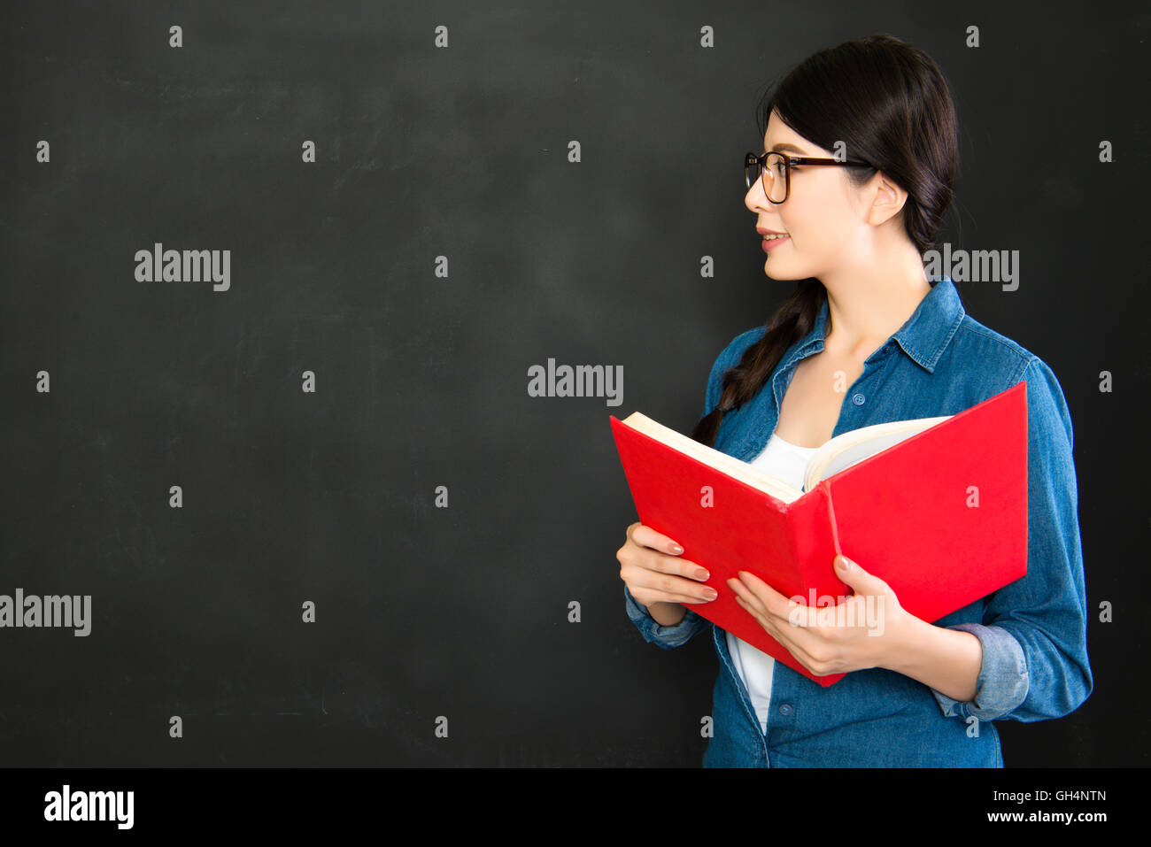 intelligence student presentation her work with glasses and textbook ...