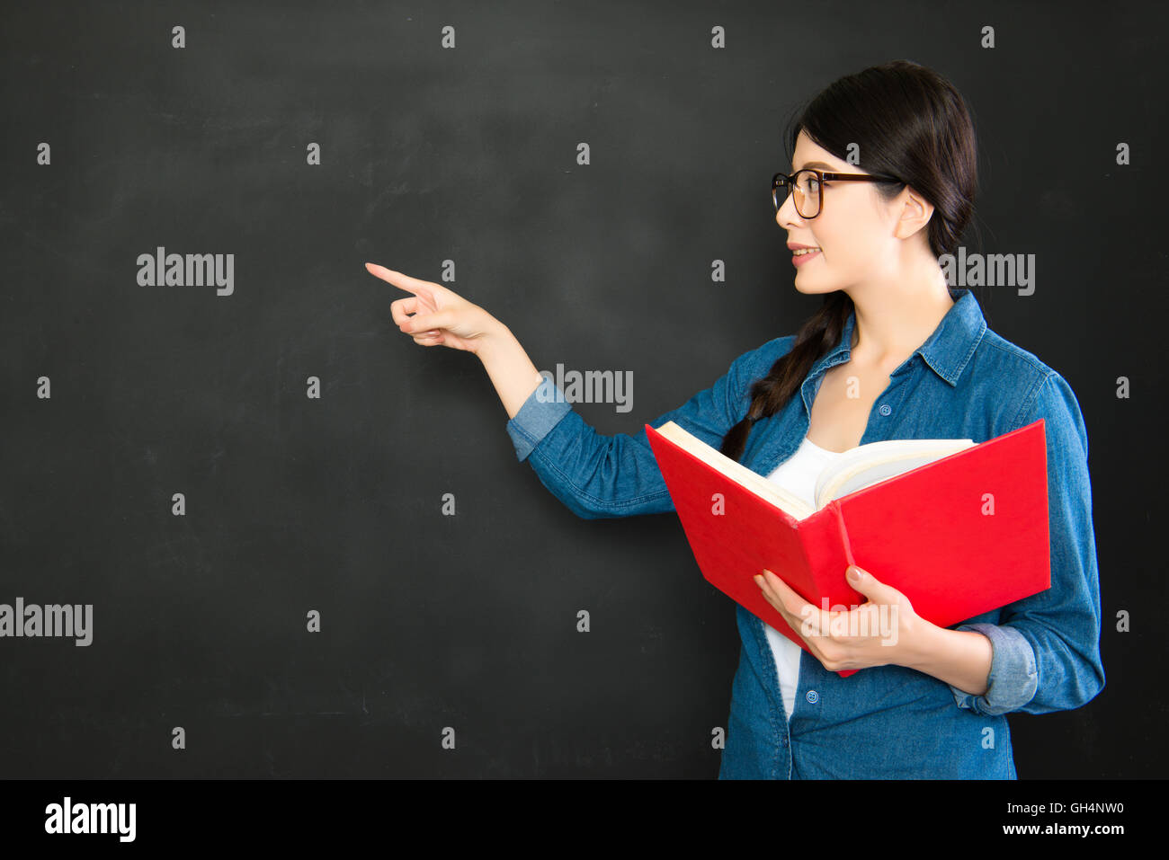 asia student presentation her work with glasses and textbook standing ...