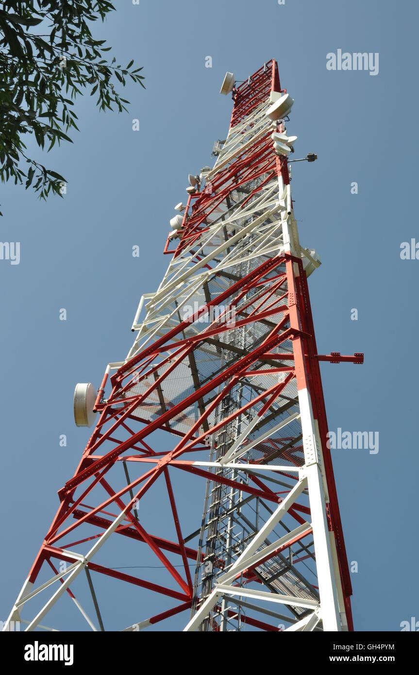High Steel Telecommunication tower with systems of antennas against the ...