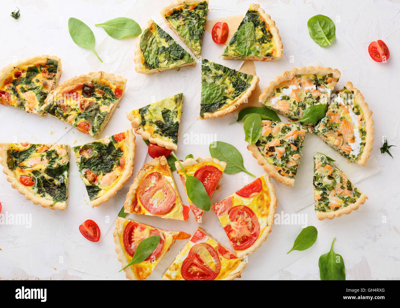 Four summer pie with vegetables on white background. Food top view ...