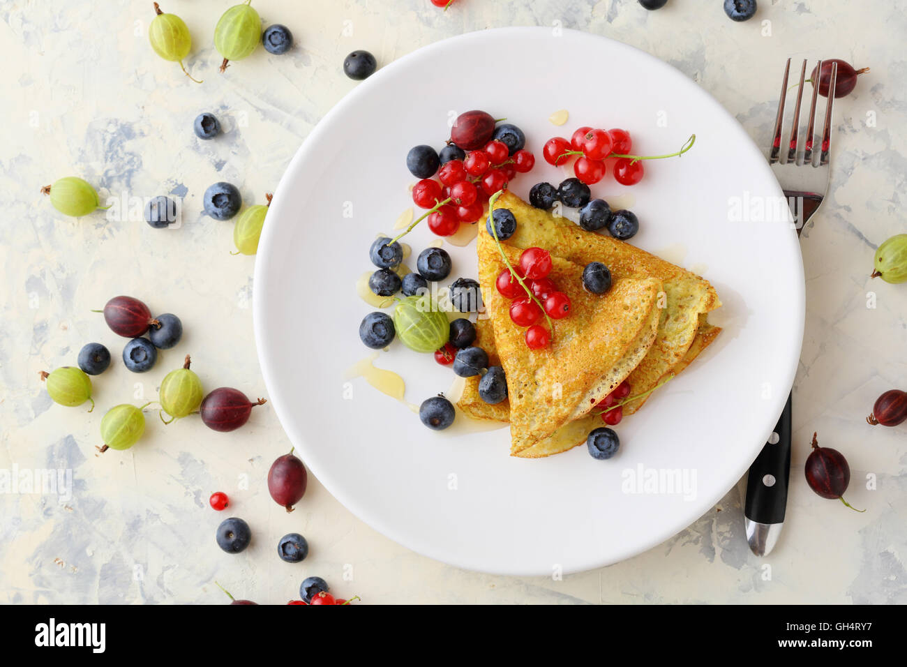 summer crepe on white plate, food top view Stock Photo - Alamy