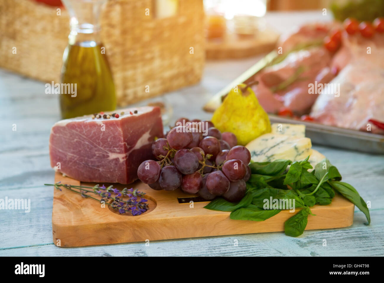 Raw meat and grapes Stock Photo - Alamy