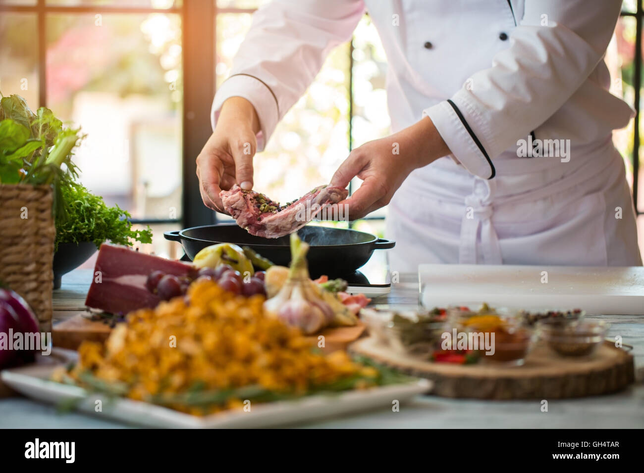 Hands hold piece of meat Stock Photo - Alamy