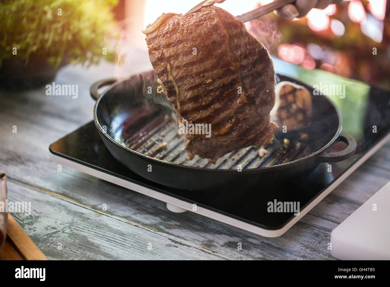 Piece of grilled meat Stock Photo - Alamy
