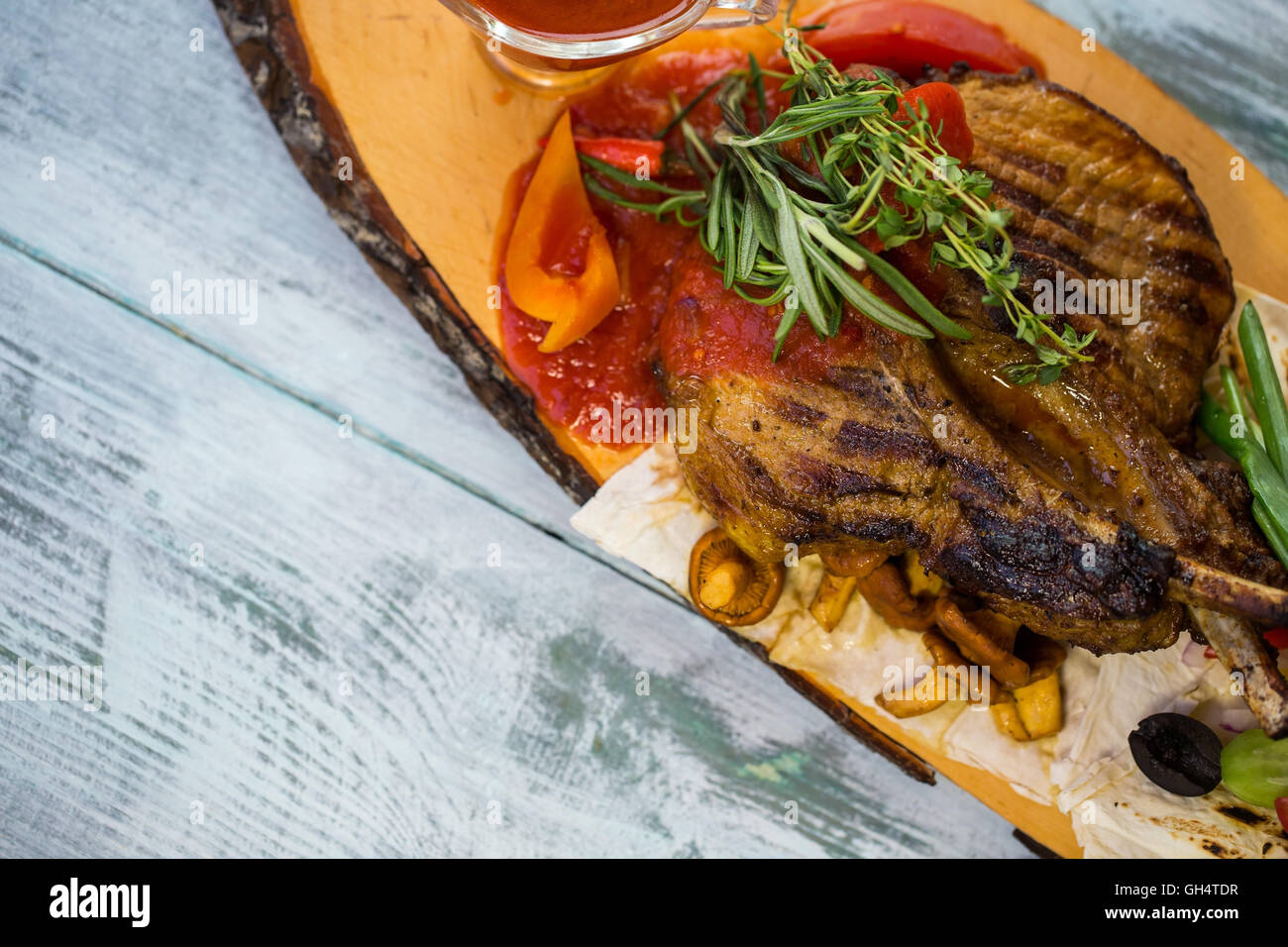 Cooked meat and herbs Stock Photo - Alamy