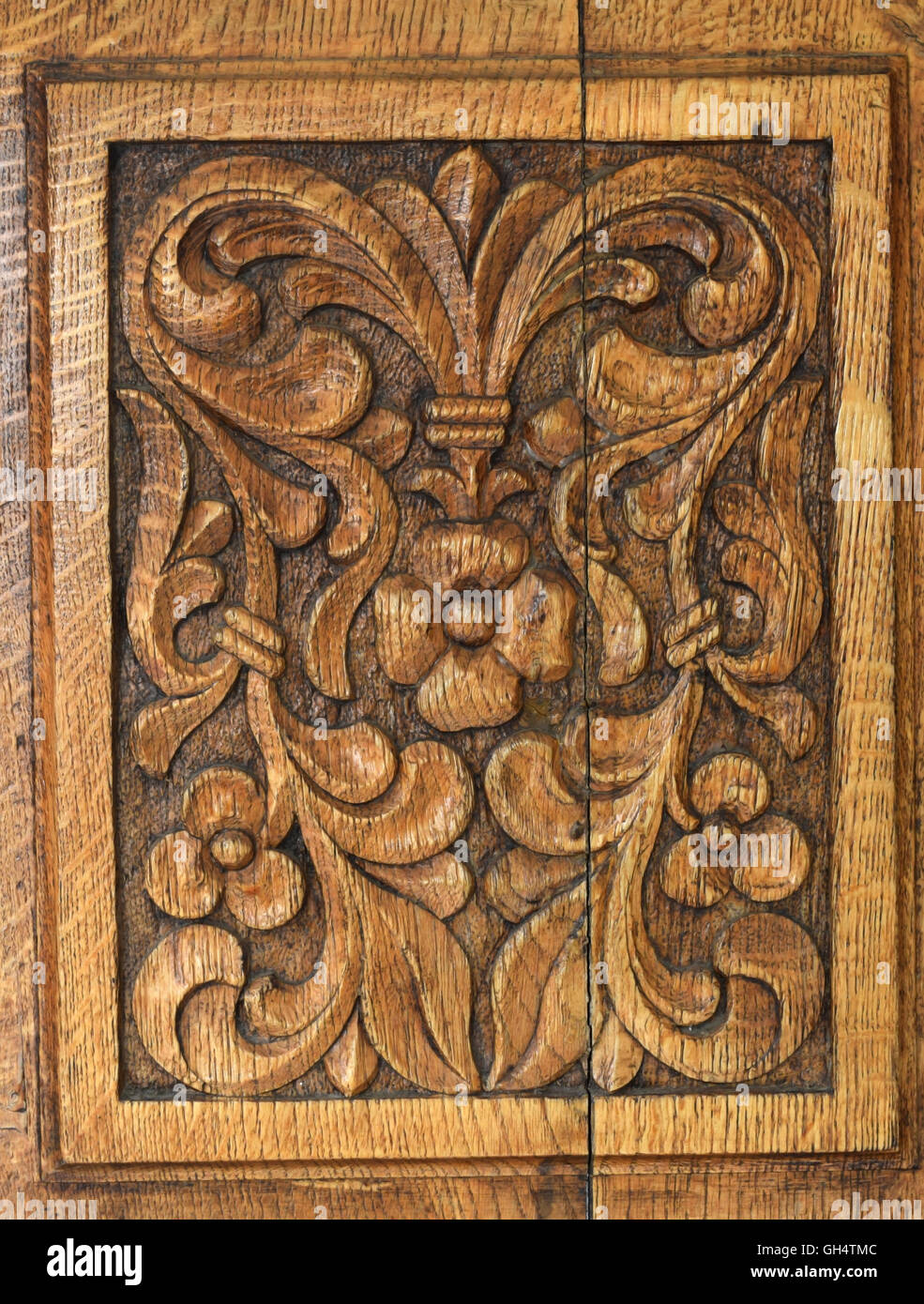 traditional door panel carved in wood at the old monastery Stock Photo ...