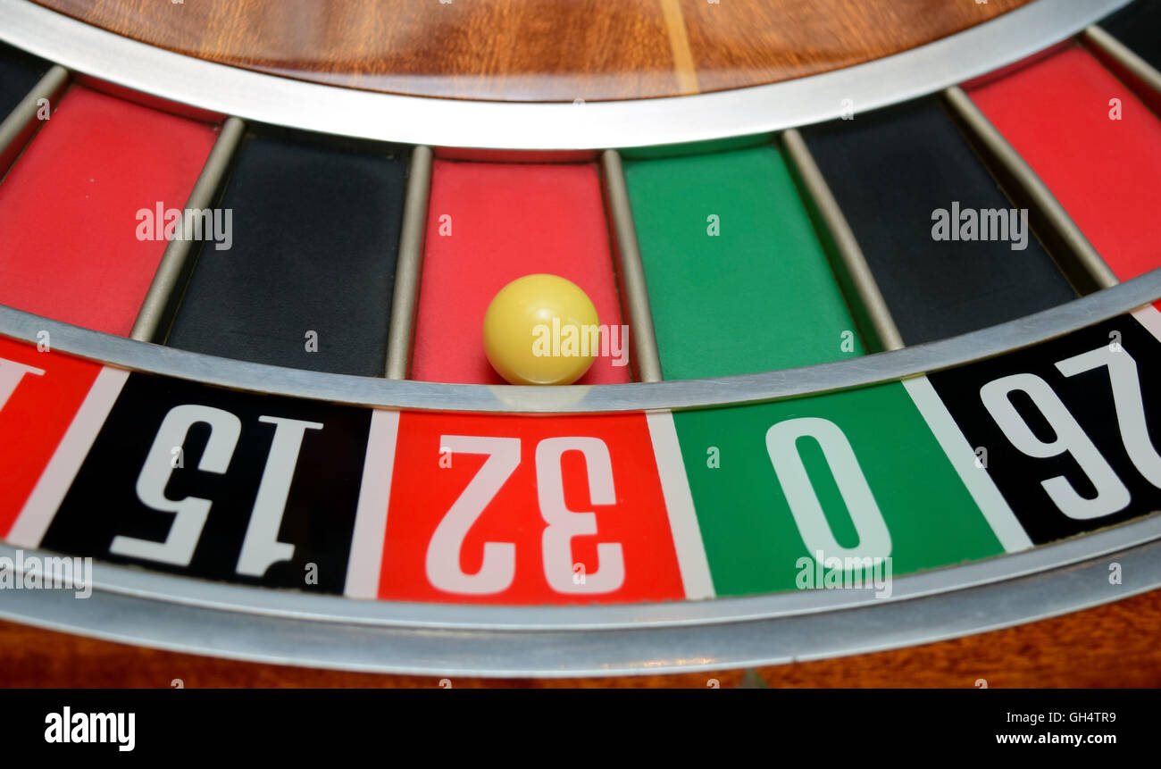 ball in winning number thirty two at roulette wheel Stock Photo - Alamy