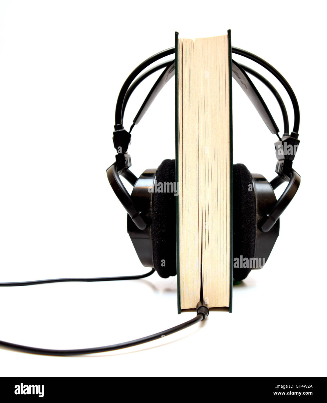audio headphones and book with white background isolated Stock Photo ...