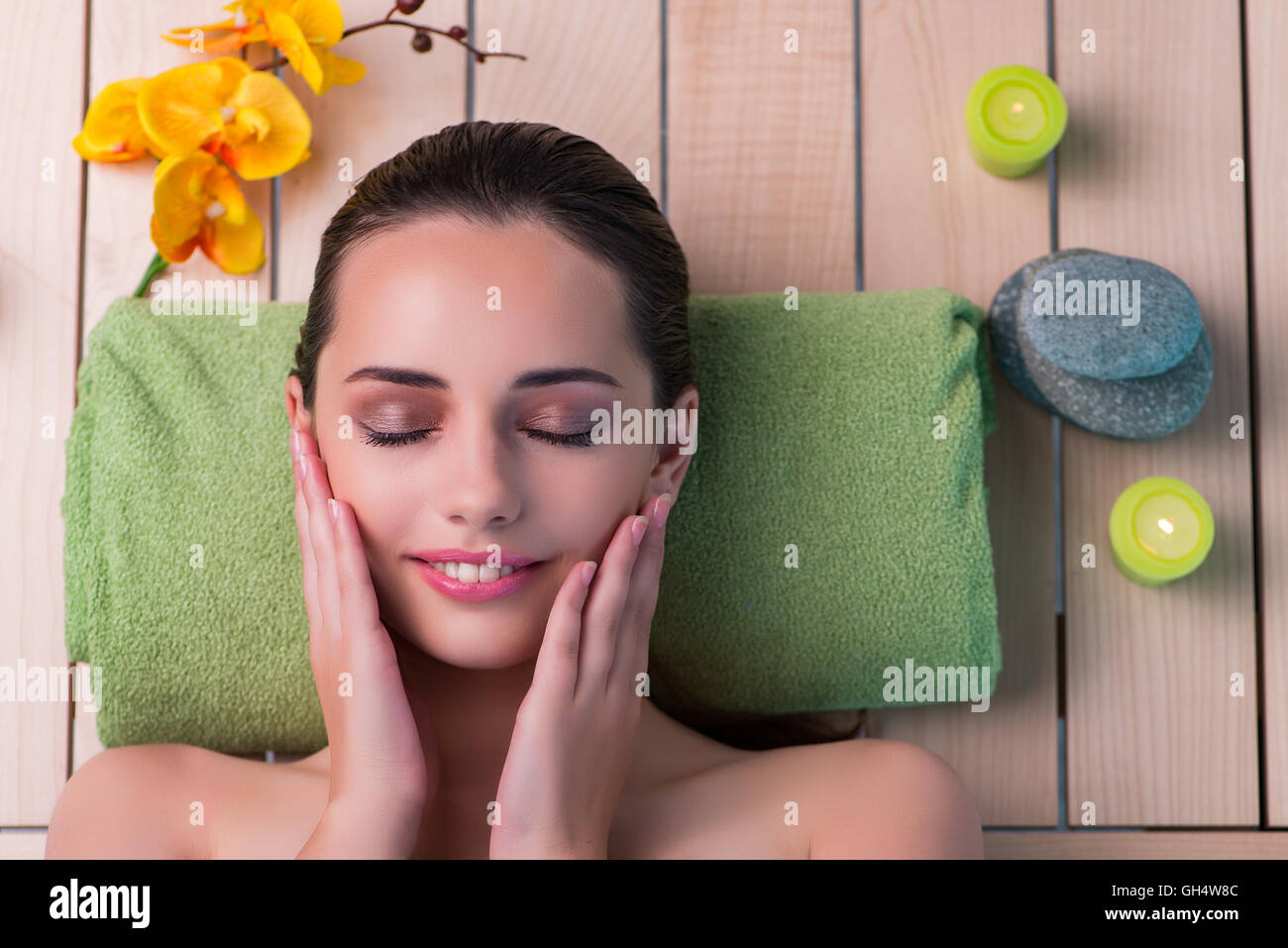 Young beautiful woman during spa procedure Stock Photo - Alamy