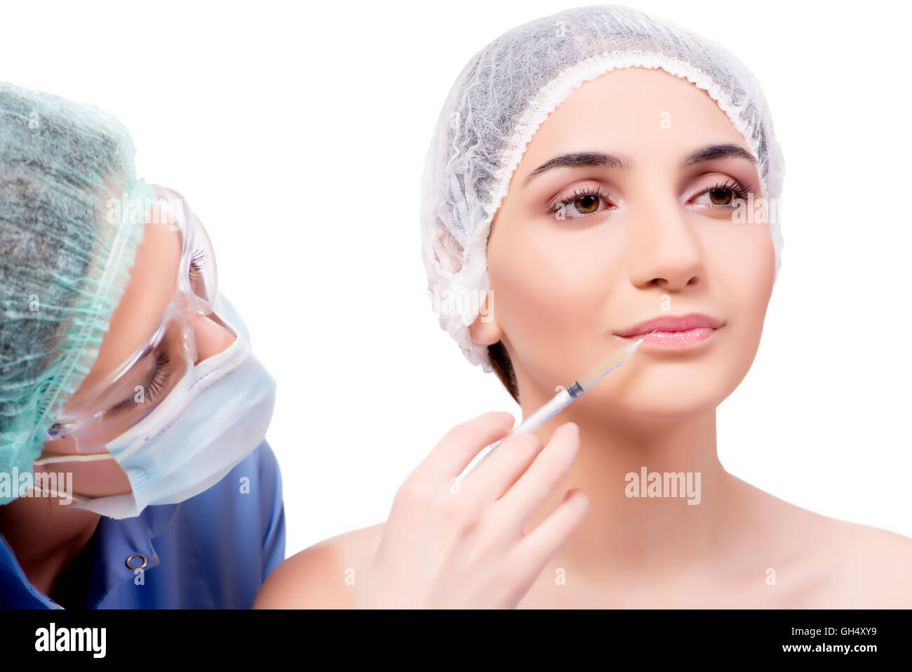 Young woman preparing for plastic surgery isolated on white Stock Photo ...