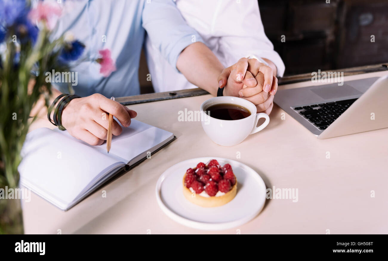 Sit on hands hi-res stock photography and images - Alamy