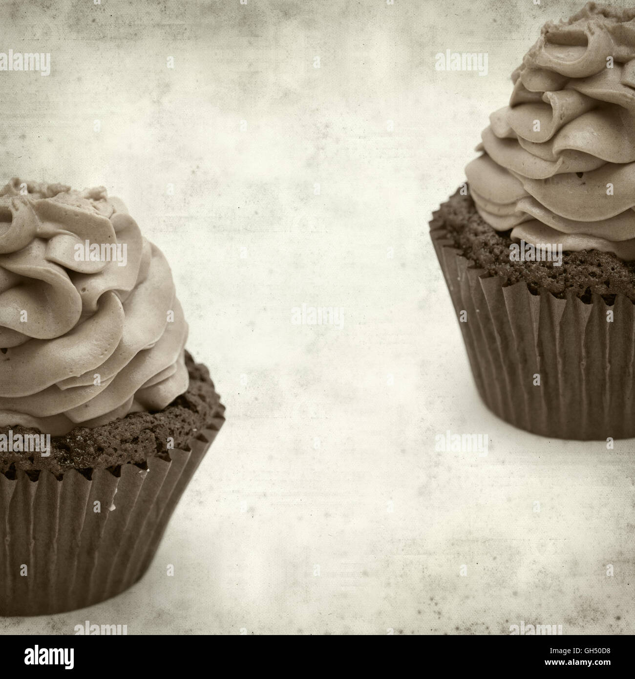 textured old paper background with cupcake with swirled icing Stock ...