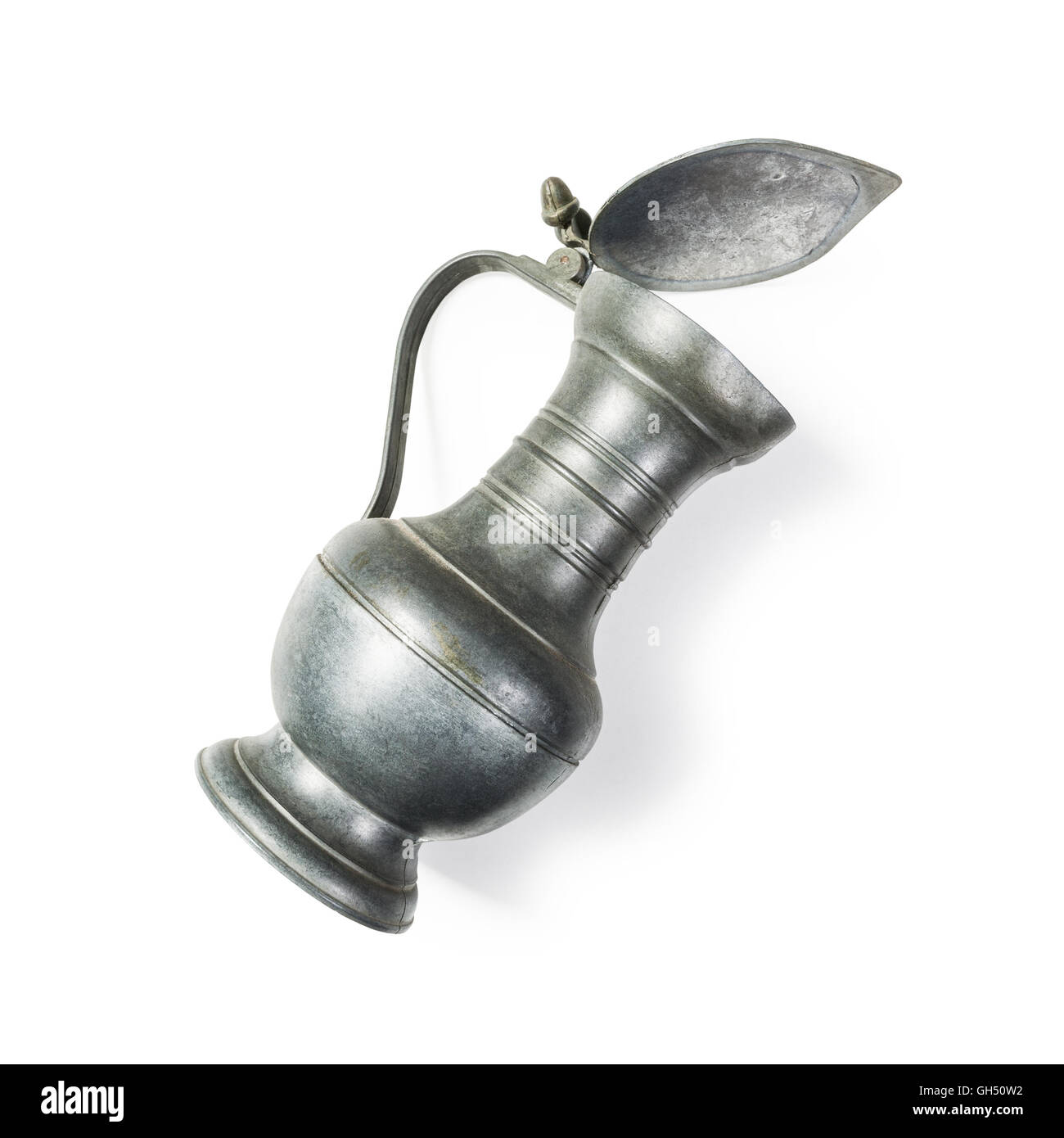 Medieval old tin jug isolated on white background. Single object with ...