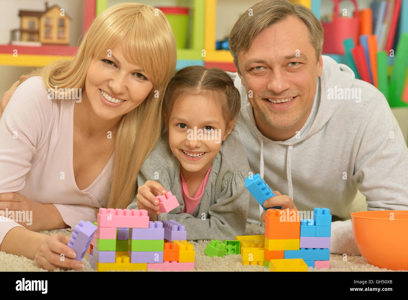 happy family playing at home Stock Photo - Alamy