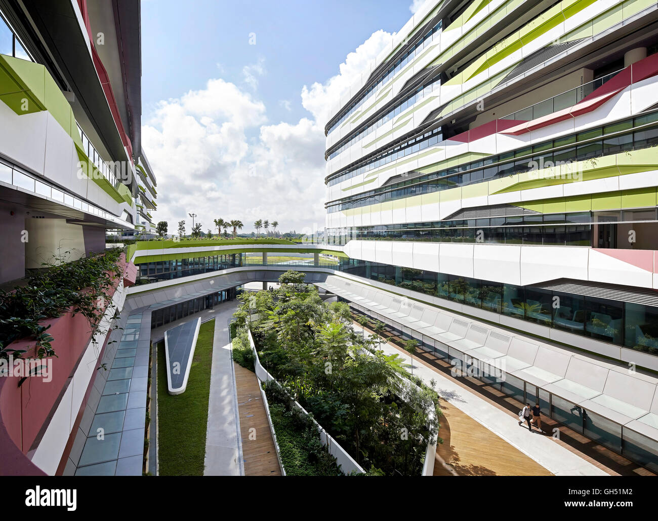 Elevated view along covered walkways and bridge link. Singapore ...
