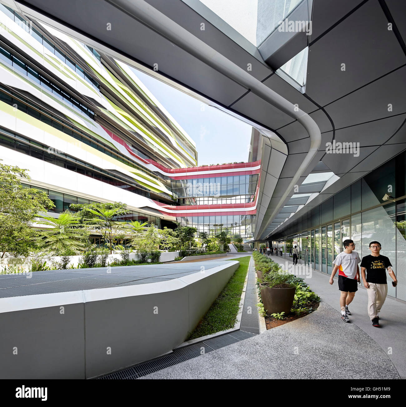 Covered walkways with natural vegetation. Singapore University of ...