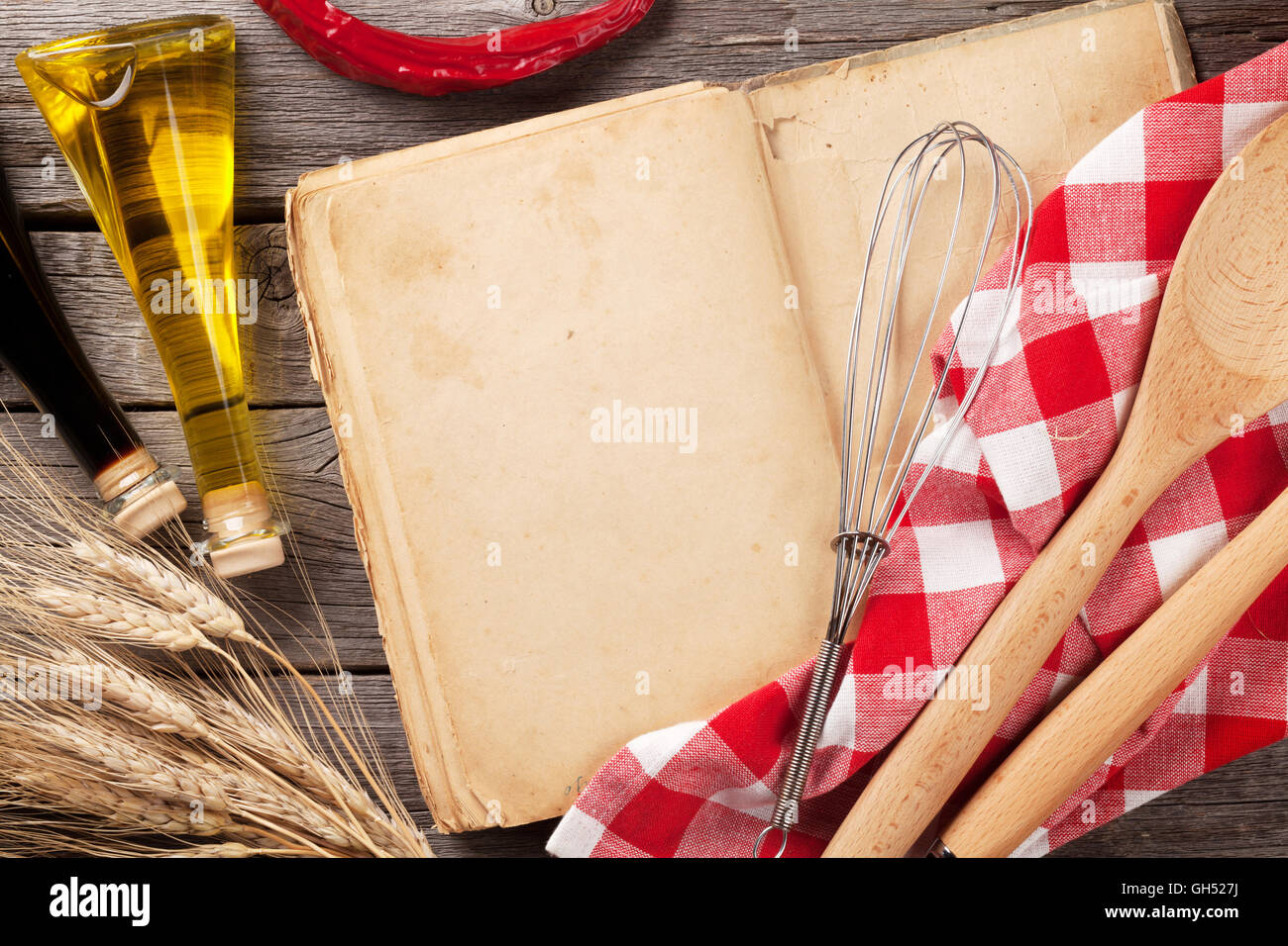 Blank vintage recipe cooking book, utensils and ingredients on wooden ...