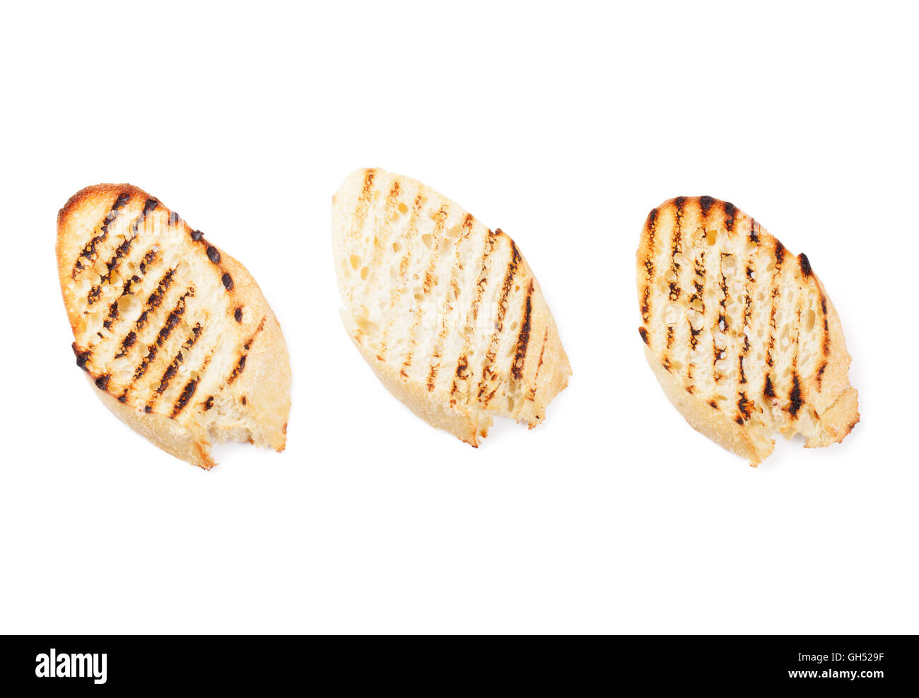 Grilled toast bread. Isolated on white background Stock Photo - Alamy