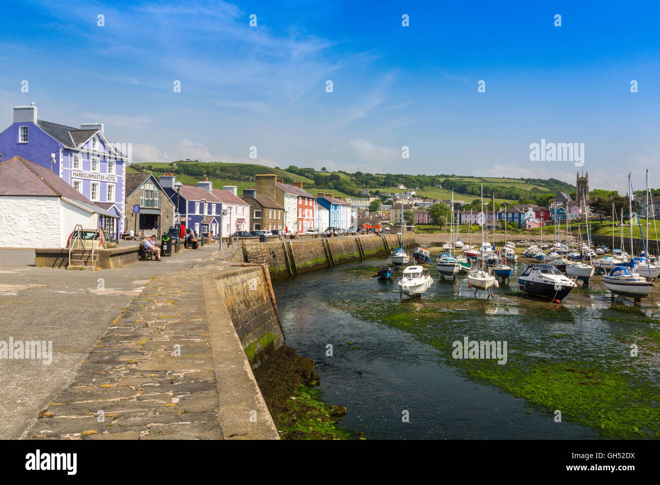 Colourful terraces of houses line the harbour at Aberaeron, Ceredigion ...