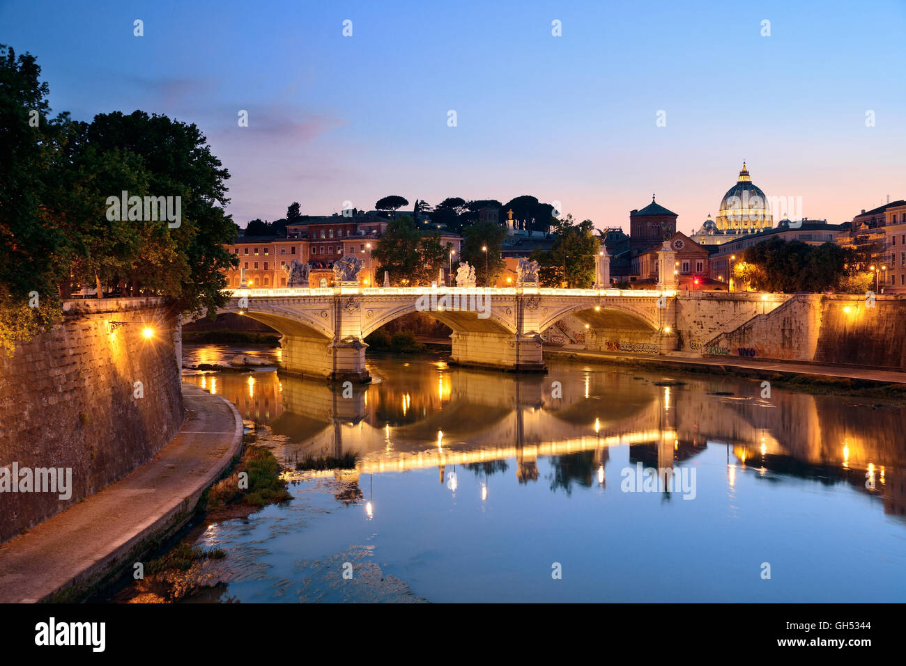 River Tiber and St Peters Basilica in Vatican City at dusk Stock Photo ...