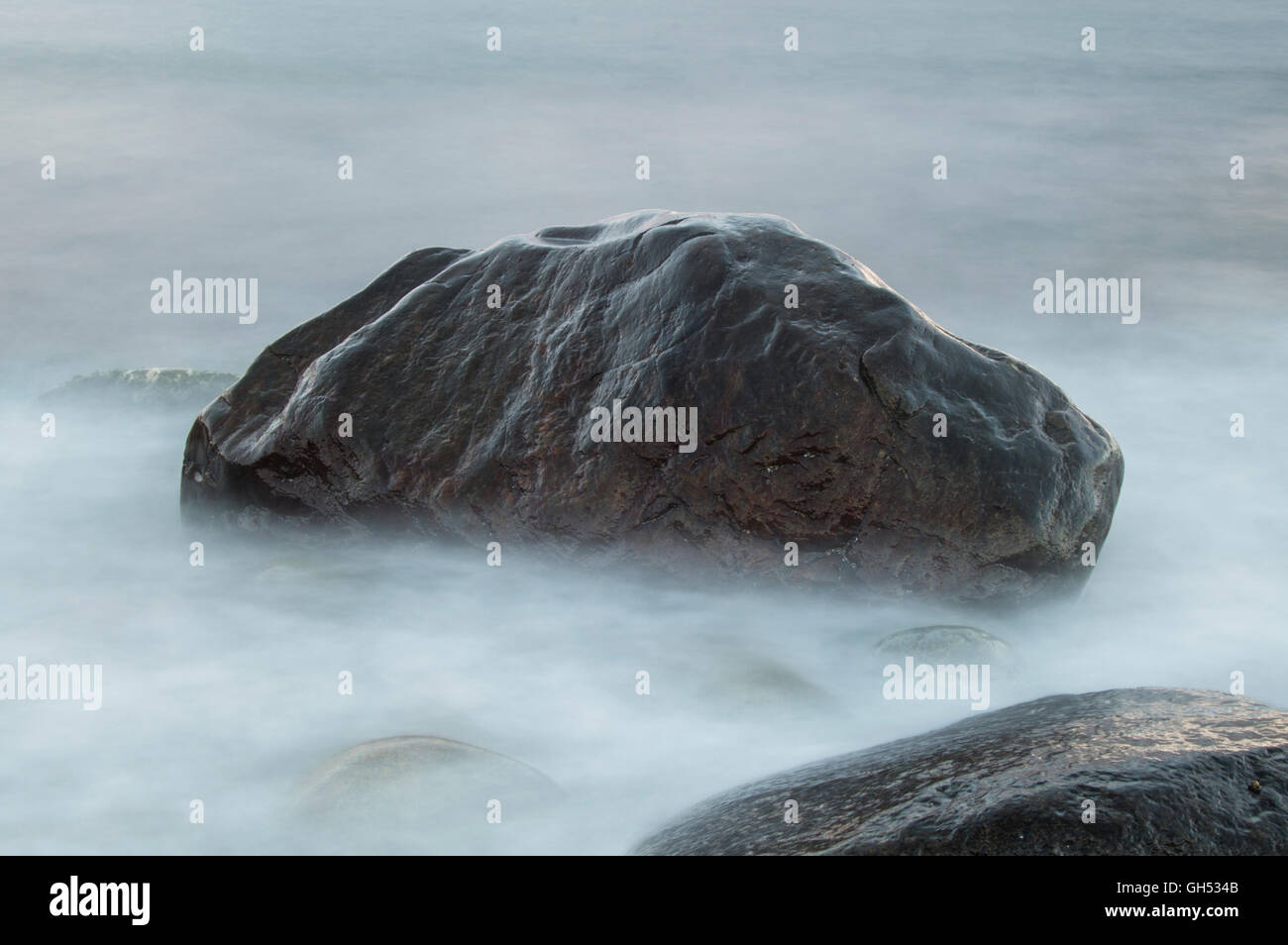 Wave hitting stone at Mølen, Larvik, Norway Stock Photo - Alamy